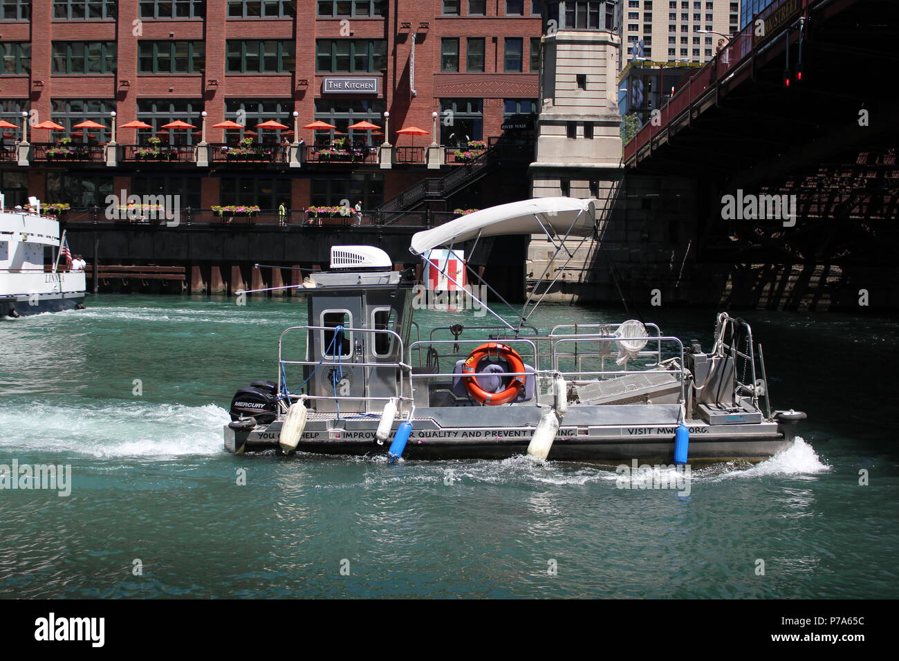Garbage boat collects river debris hi-res stock photography and images ...