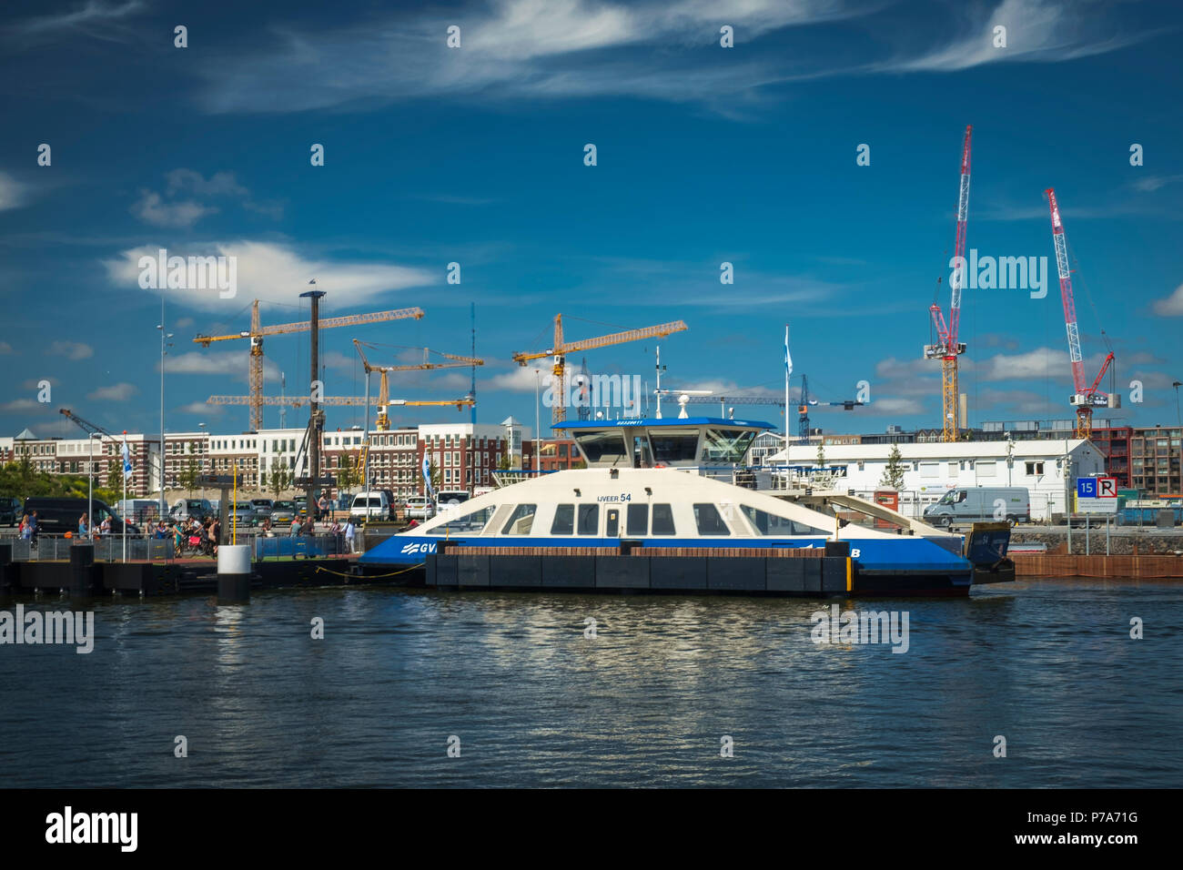 Passenger ferry docking at the new terminal in Amsterdam West Stock ...