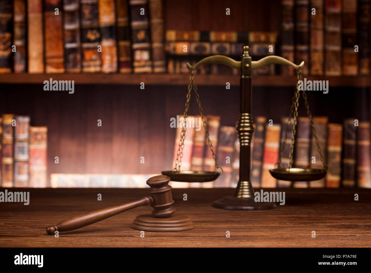 law theme, mallet of the judge, justice scale, books, wooden desk Stock Photo - Alamy