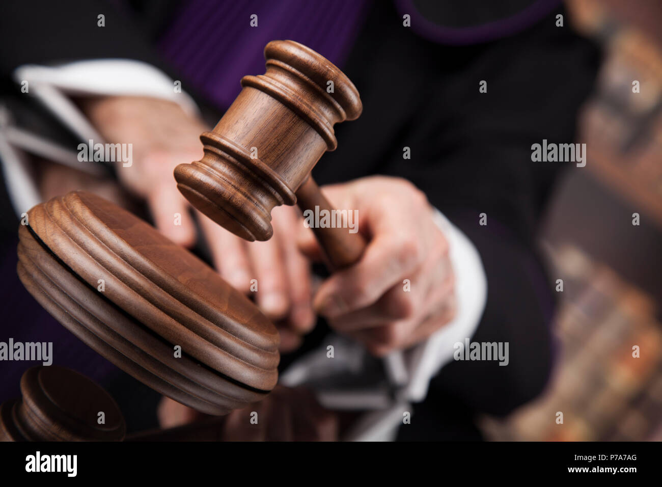 Judge, male judge in a courtroom striking the gavel Stock Photo - Alamy