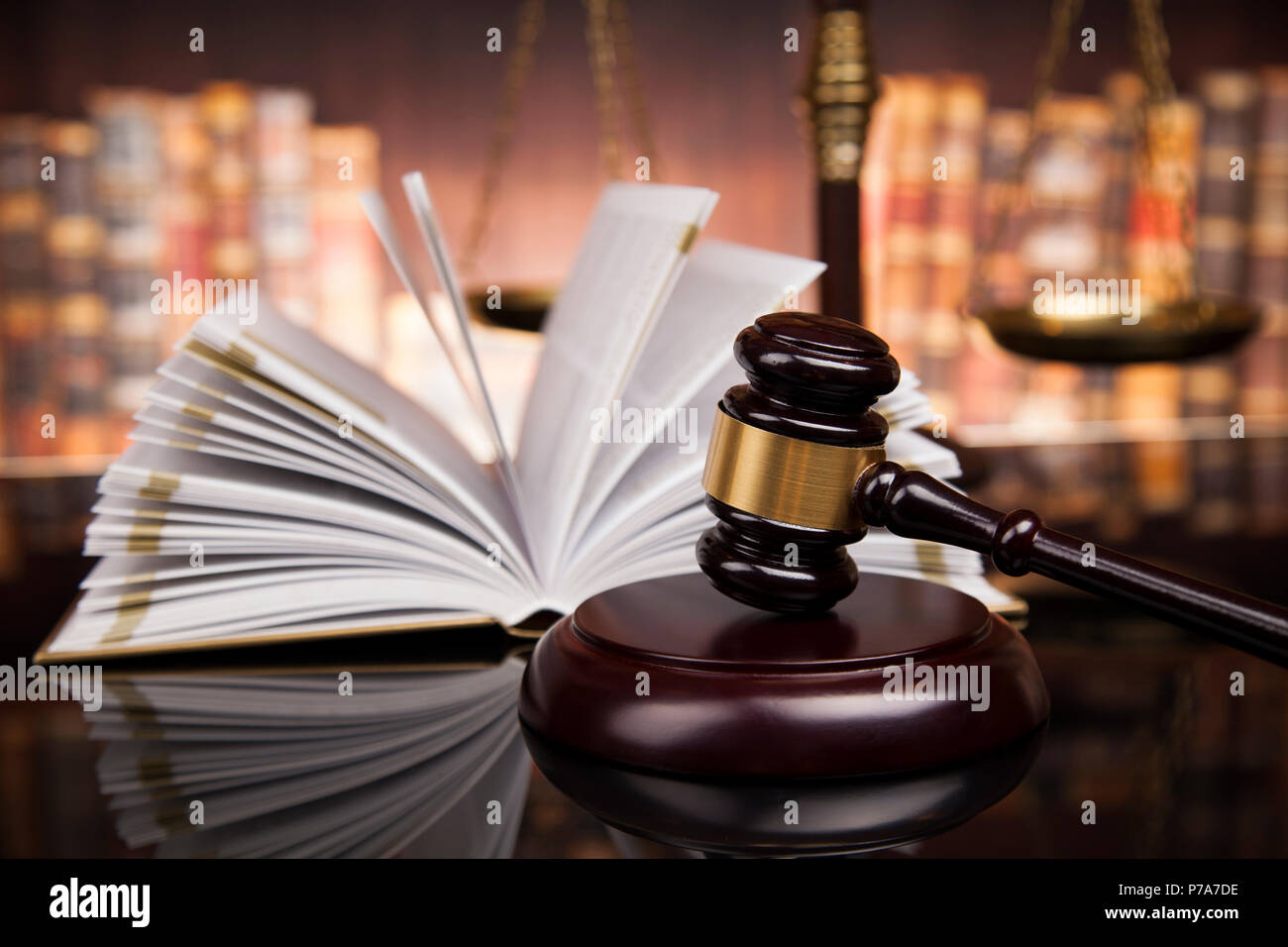 Judge gavel and scales of justice and book background Stock Photo - Alamy