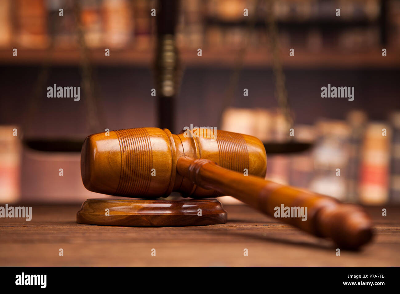 law theme, mallet of the judge, justice scale, books, wooden desk Stock Photo - Alamy