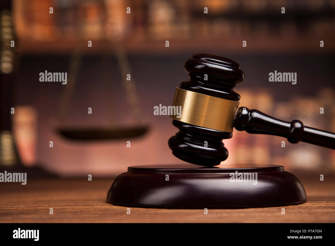 Judge gavel and scales of justice and book background Stock Photo - Alamy