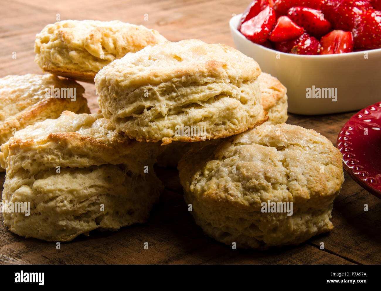 Biscuits stacked and ready to serve with strawberries Stock Photo - Alamy