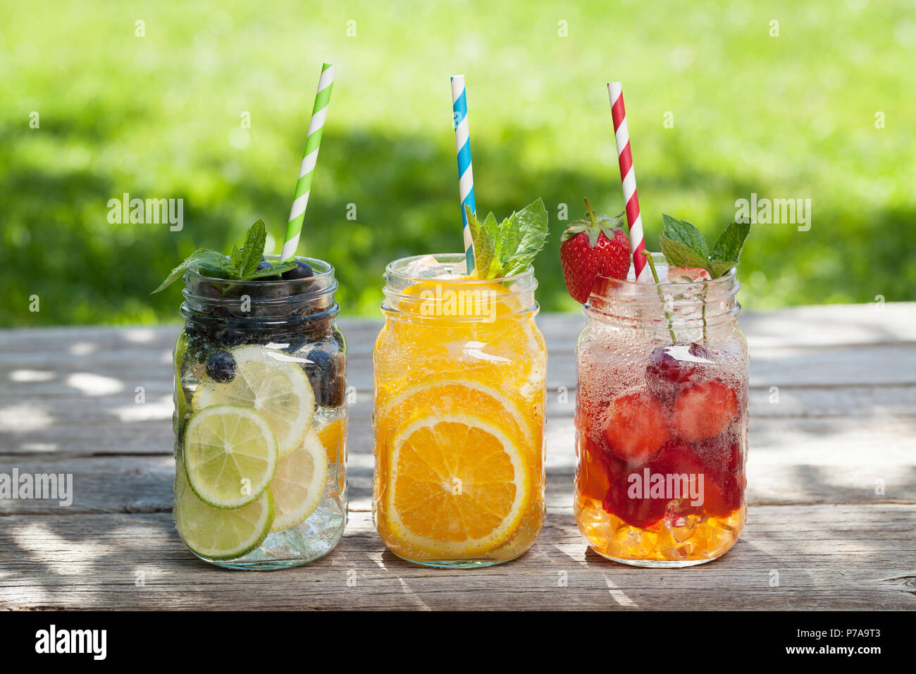Fresh lemonade jar with summer fruits and berries Stock Photo - Alamy