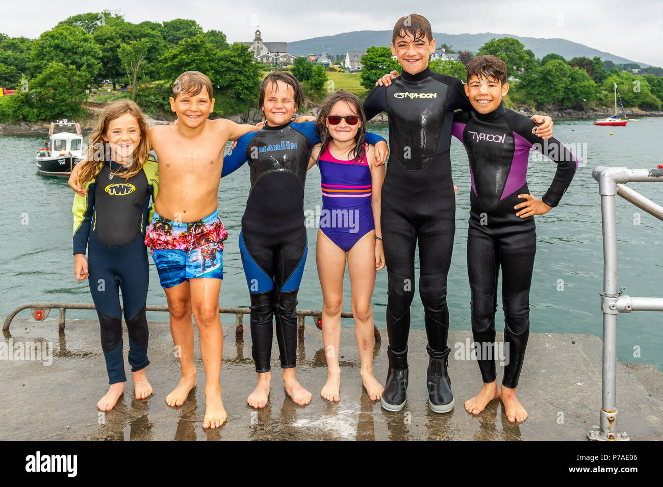 Schull, West Cork, Ireland . A group of children take the chance to ...
