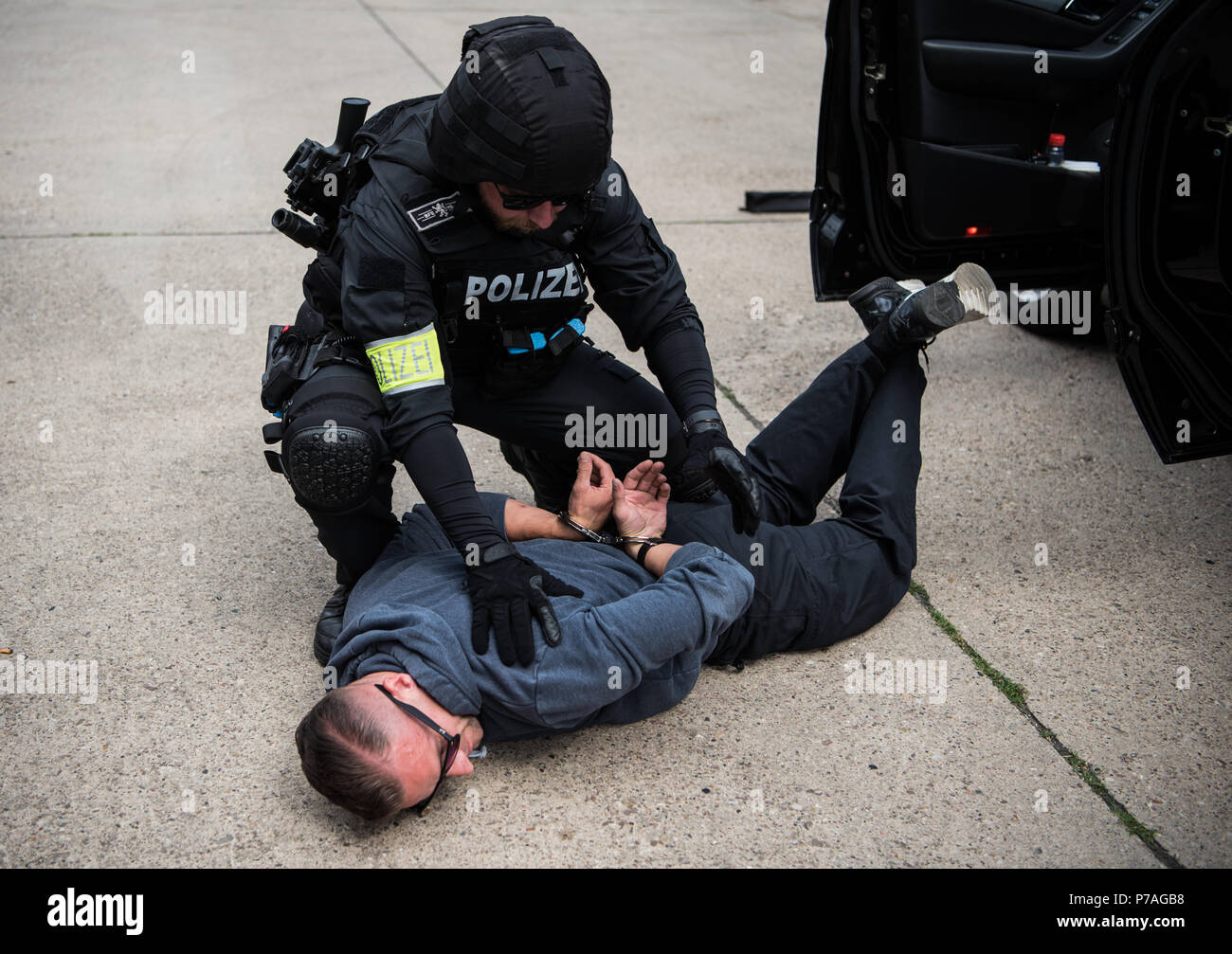 Police Officer Handcuffs High Resolution Stock Photography and Images ...