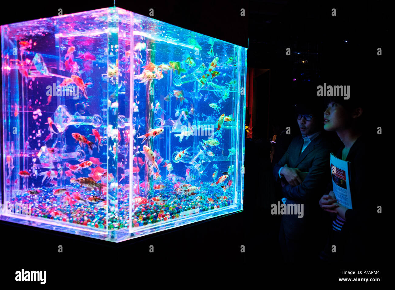 Tokyo, Japan. 5th July, 2018. Visitors look at large tank at Art ...