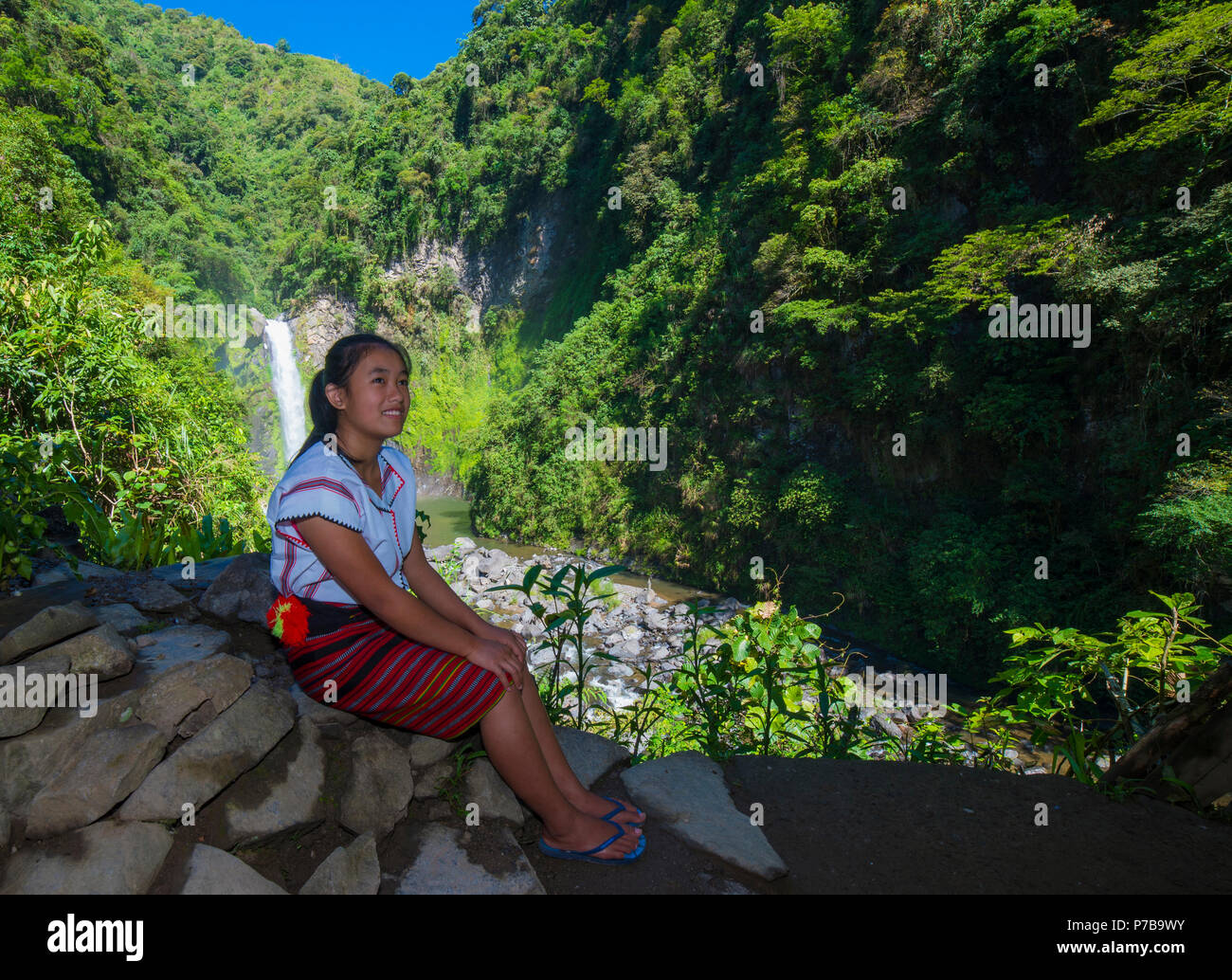 Girl from Ifugao Minority near a waterfall in Batad the Philippines ...