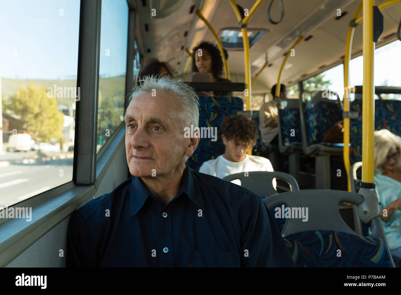 Senior man travelling in the bus Stock Photo - Alamy