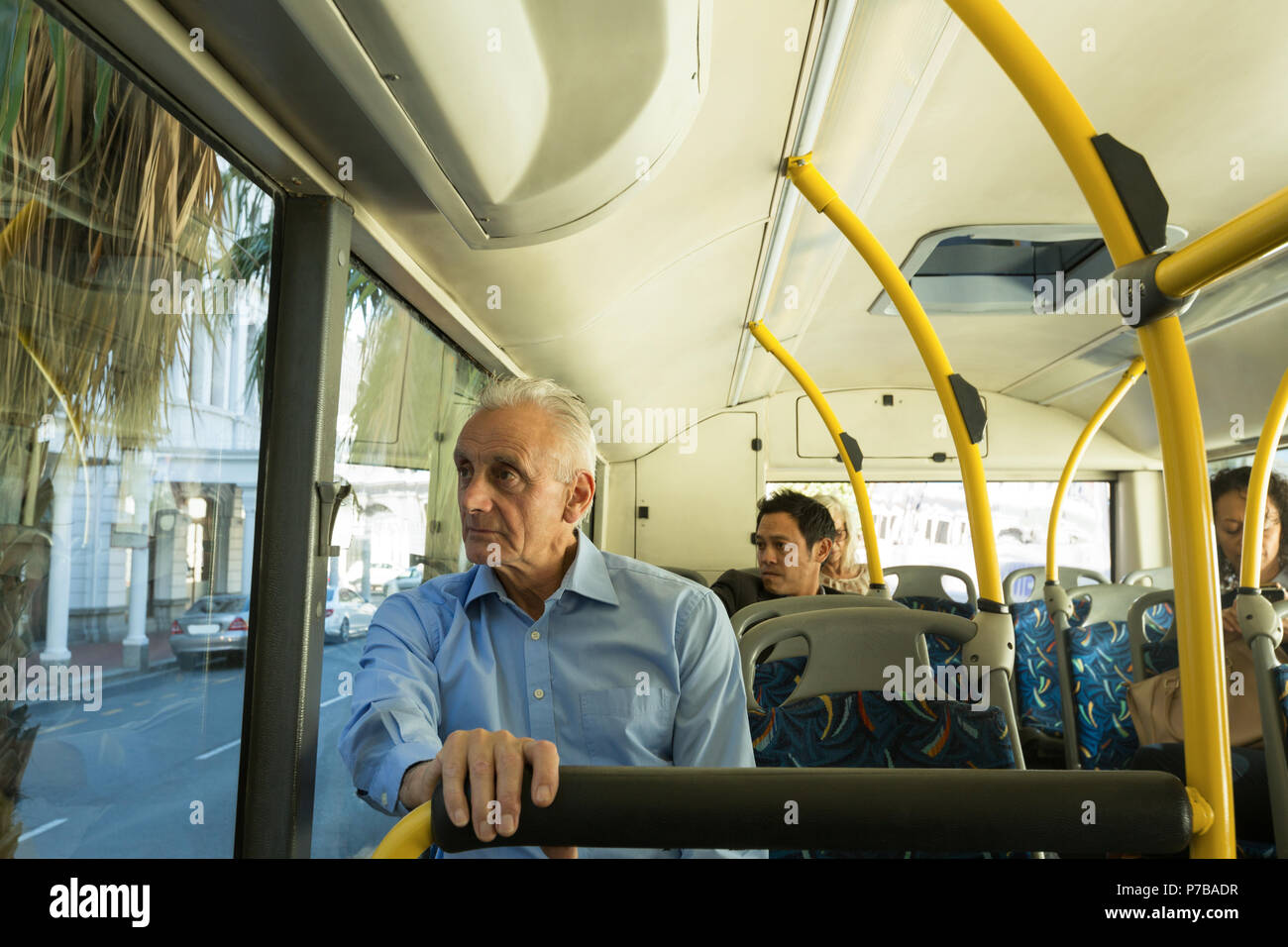 Senior man travelling in the bus Stock Photo - Alamy