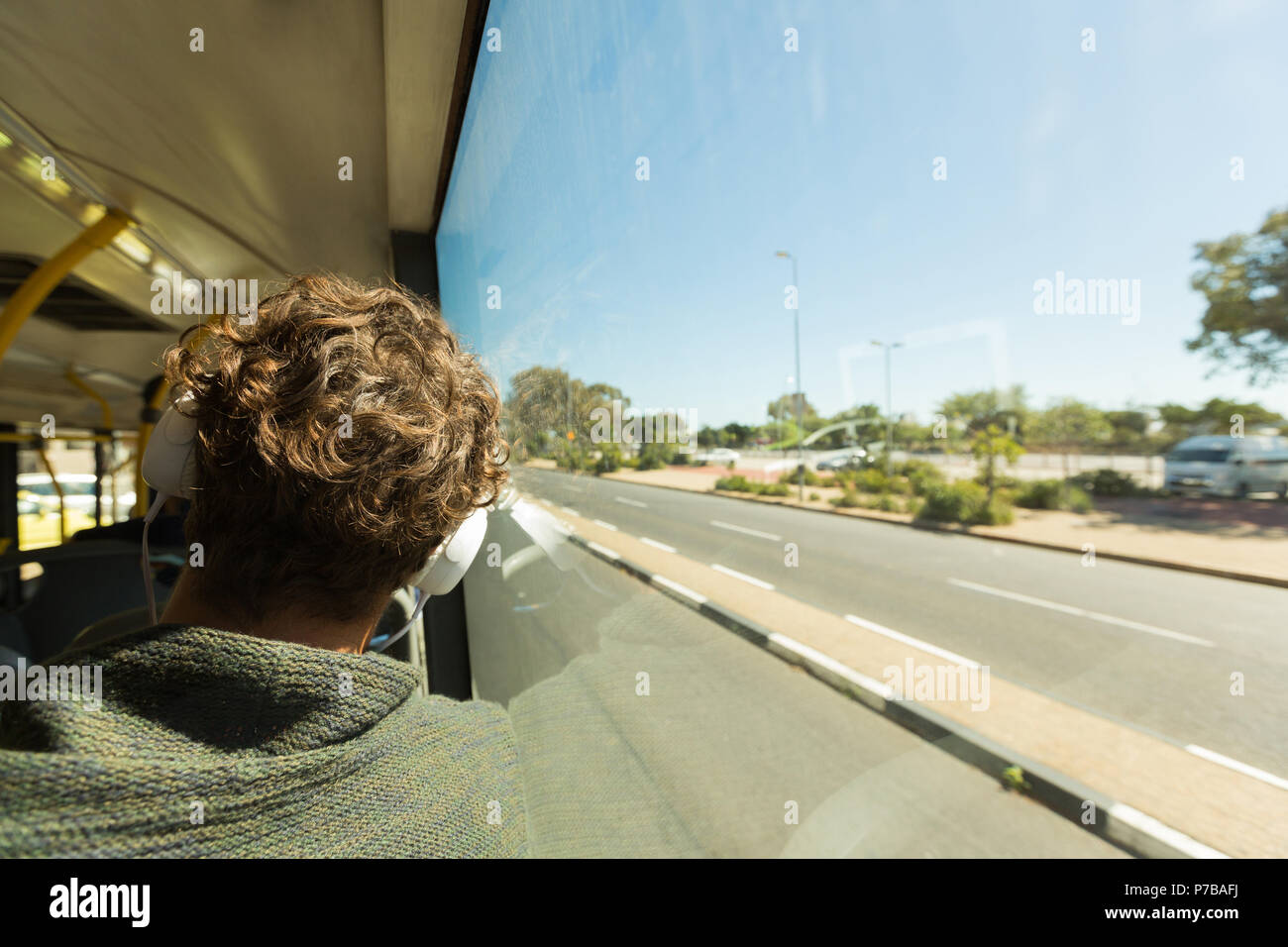 Man headphones public transport hi-res stock photography and images - Alamy