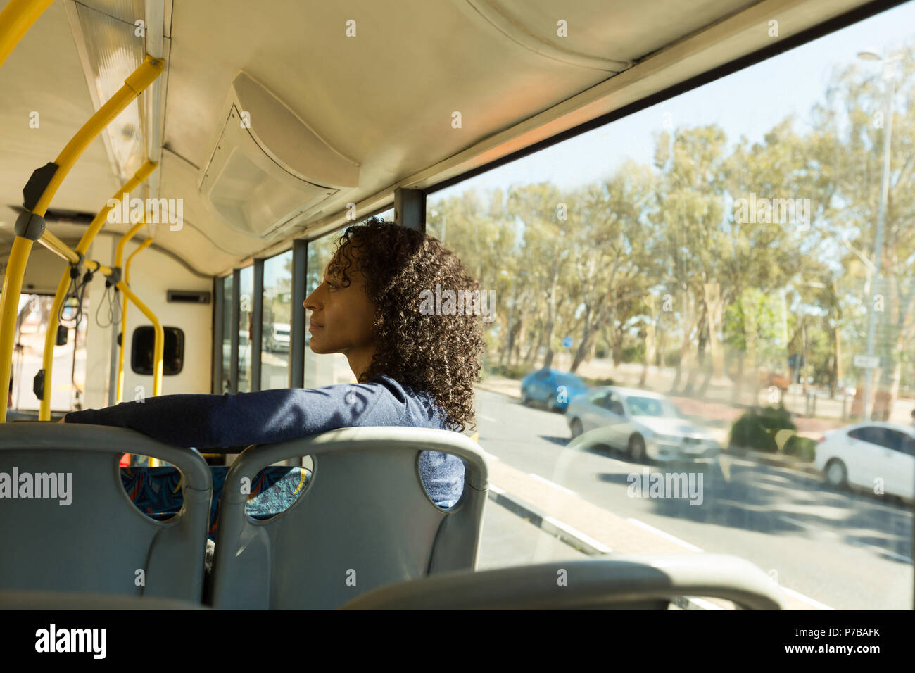 Woman travelling in the bus Stock Photo - Alamy
