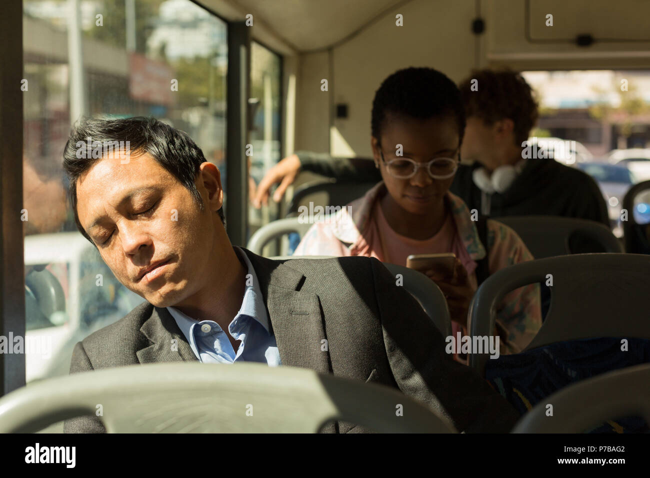 Woman bus sleeping hi-res stock photography and images - Alamy