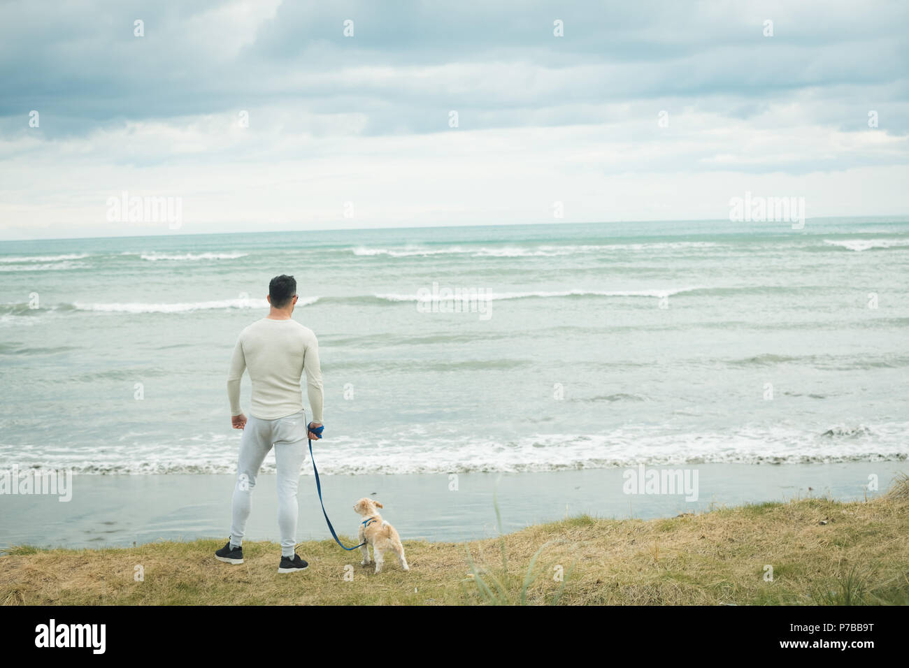 Man standing with dog hi-res stock photography and images - Alamy