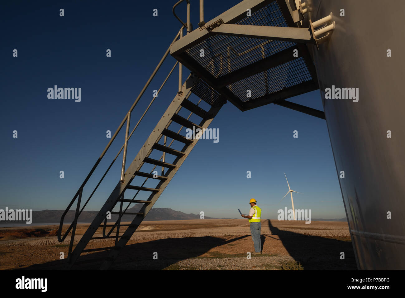 Engineer using a laptop Stock Photo - Alamy