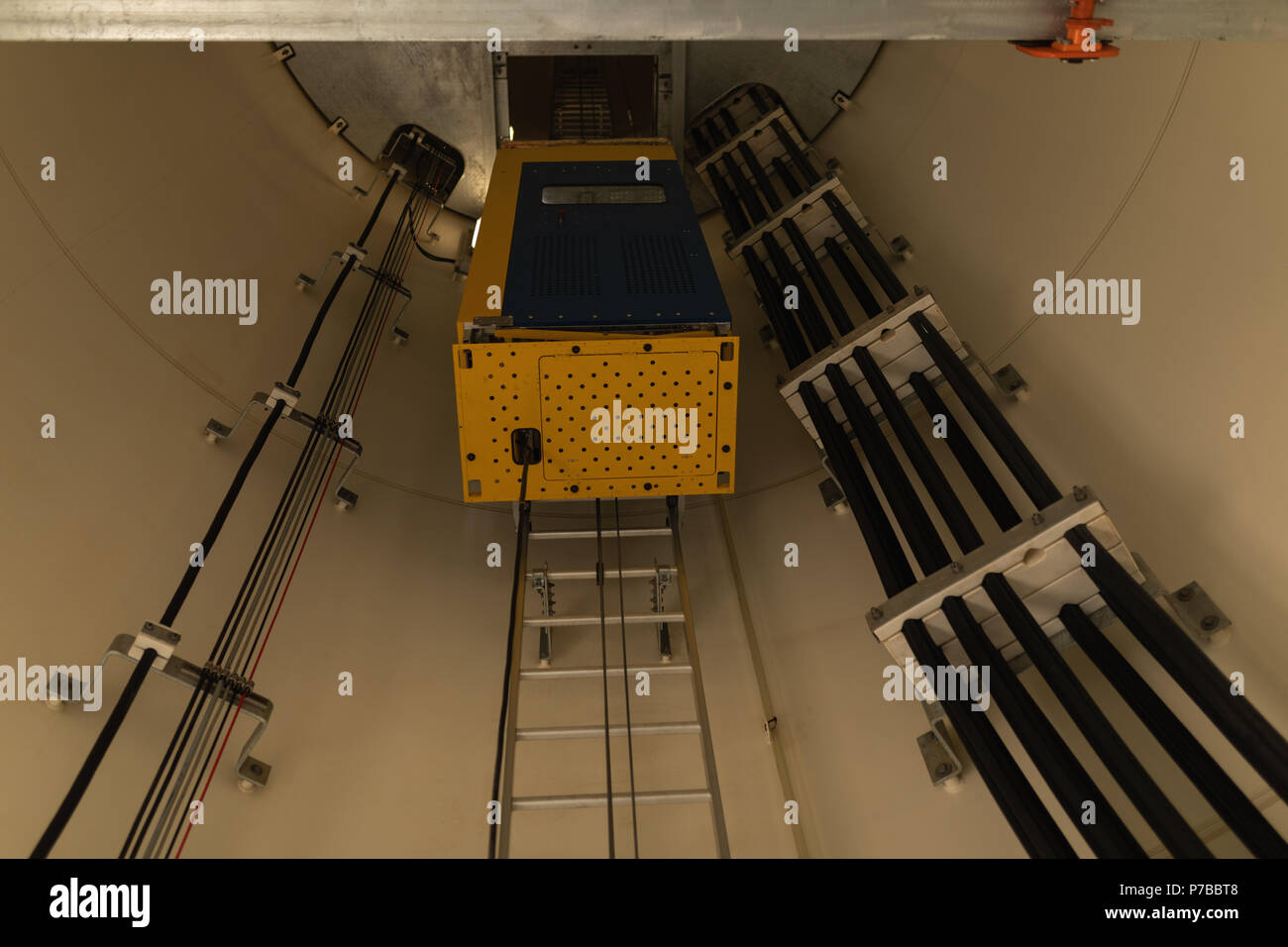 Service lift inside the wind turbine Stock Photo - Alamy