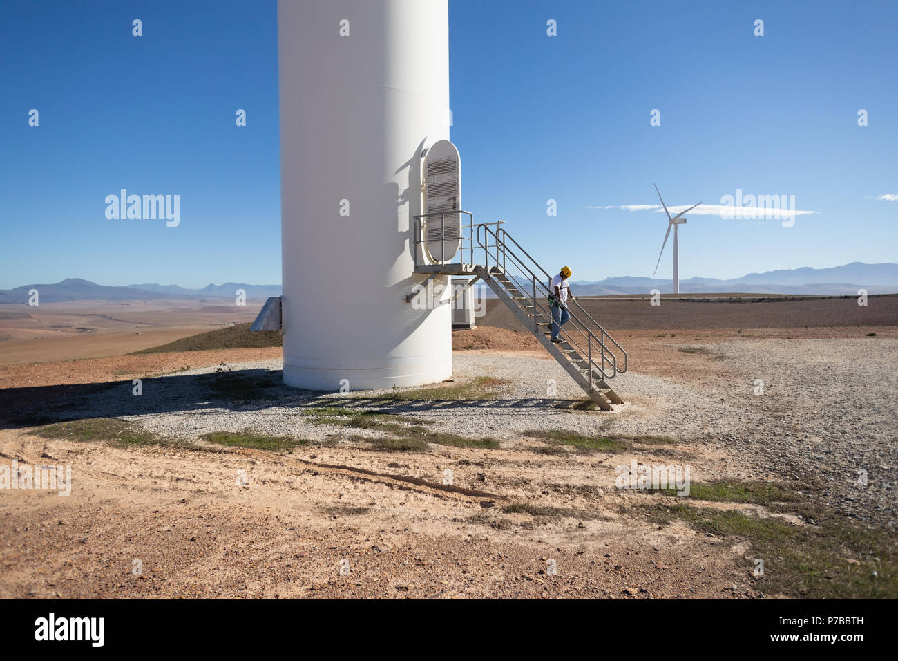 Man climbing wind turbine hi-res stock photography and images - Alamy