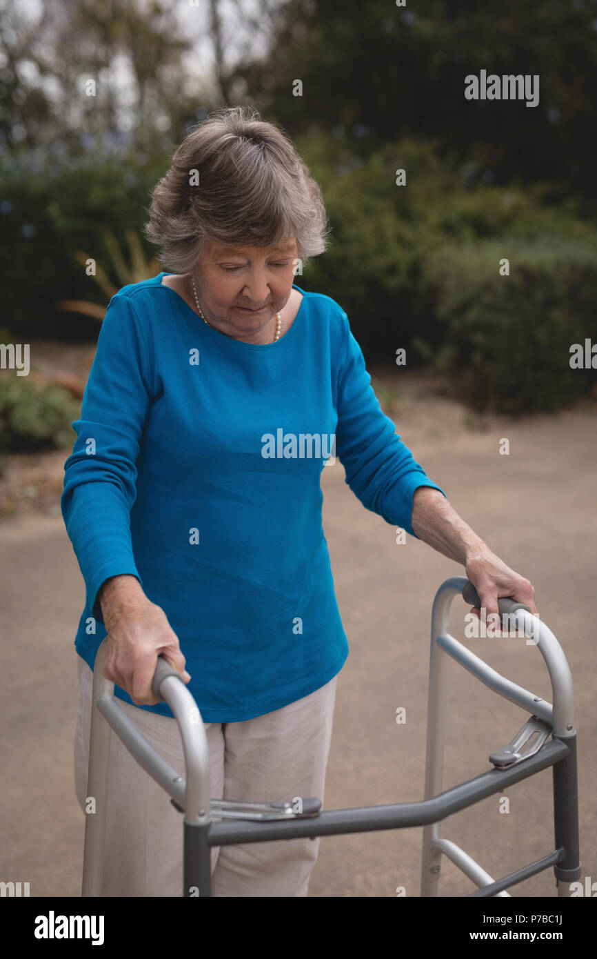 Old woman walker hi-res stock photography and images - Alamy