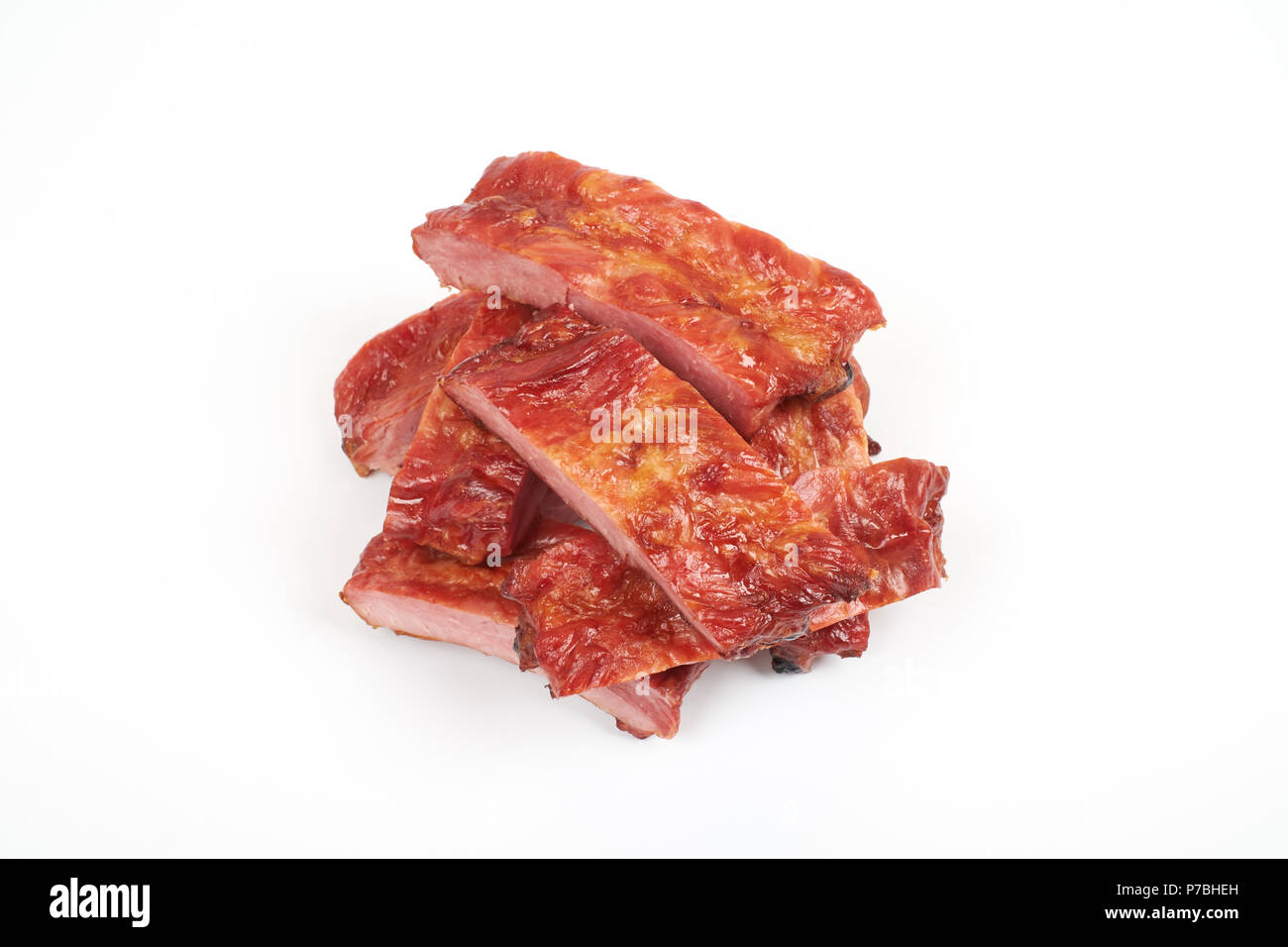 Grilled pork ribs isolated on white background Stock Photo - Alamy