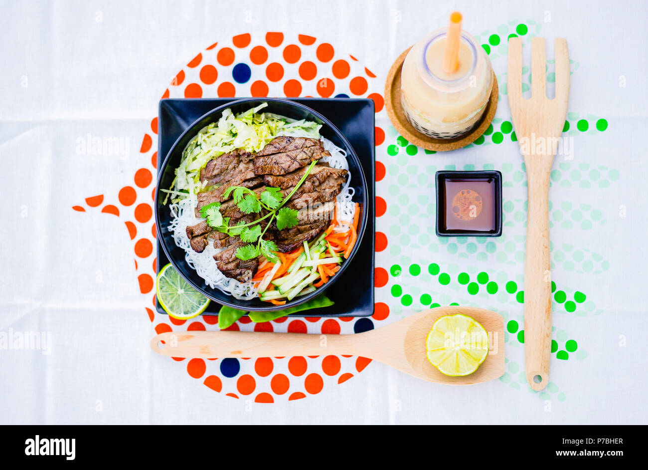 Grilled pork with rice noodles is a famous traditional food of Vietnam ...