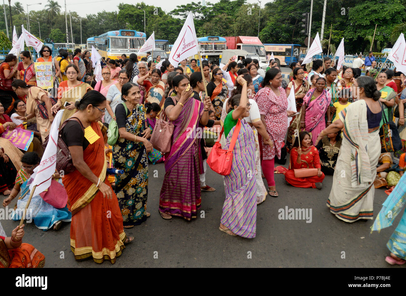 Kolkata, India. 04th July, 2018. Women activist break the law and block ...