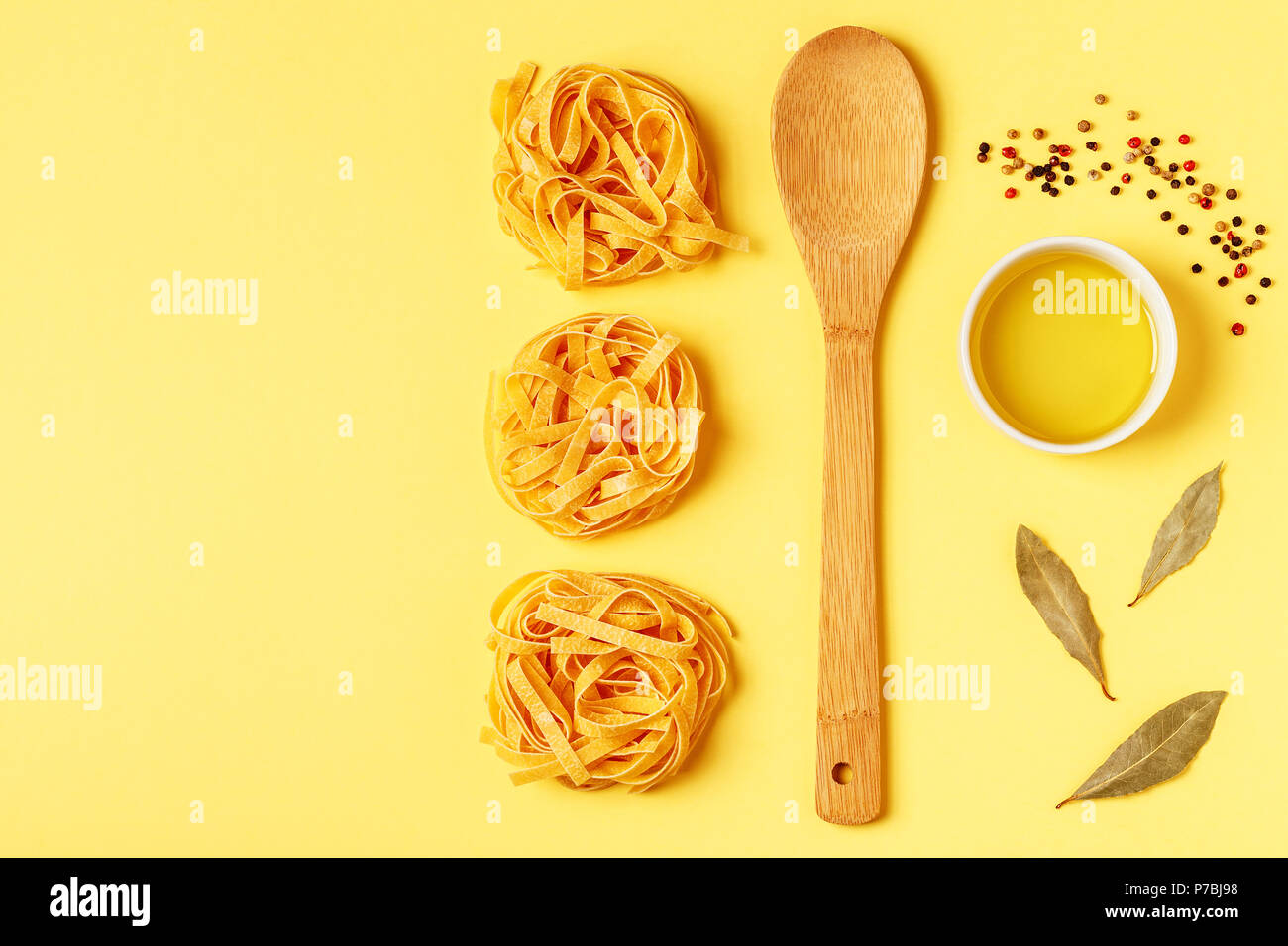 Flat lay pastel tone background. Ingredients for cooking on a yellow ...