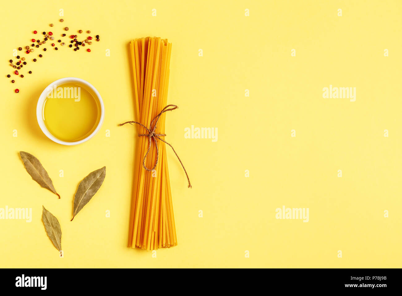 Flat lay pastel tone background. Ingredients for cooking on a yellow ...