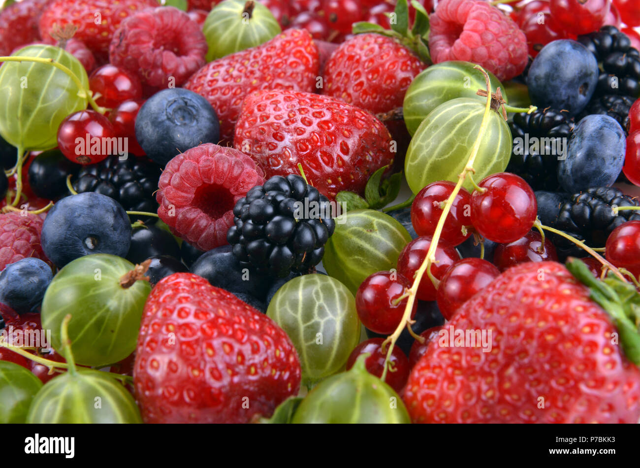 different fresh berries as background Stock Photo - Alamy