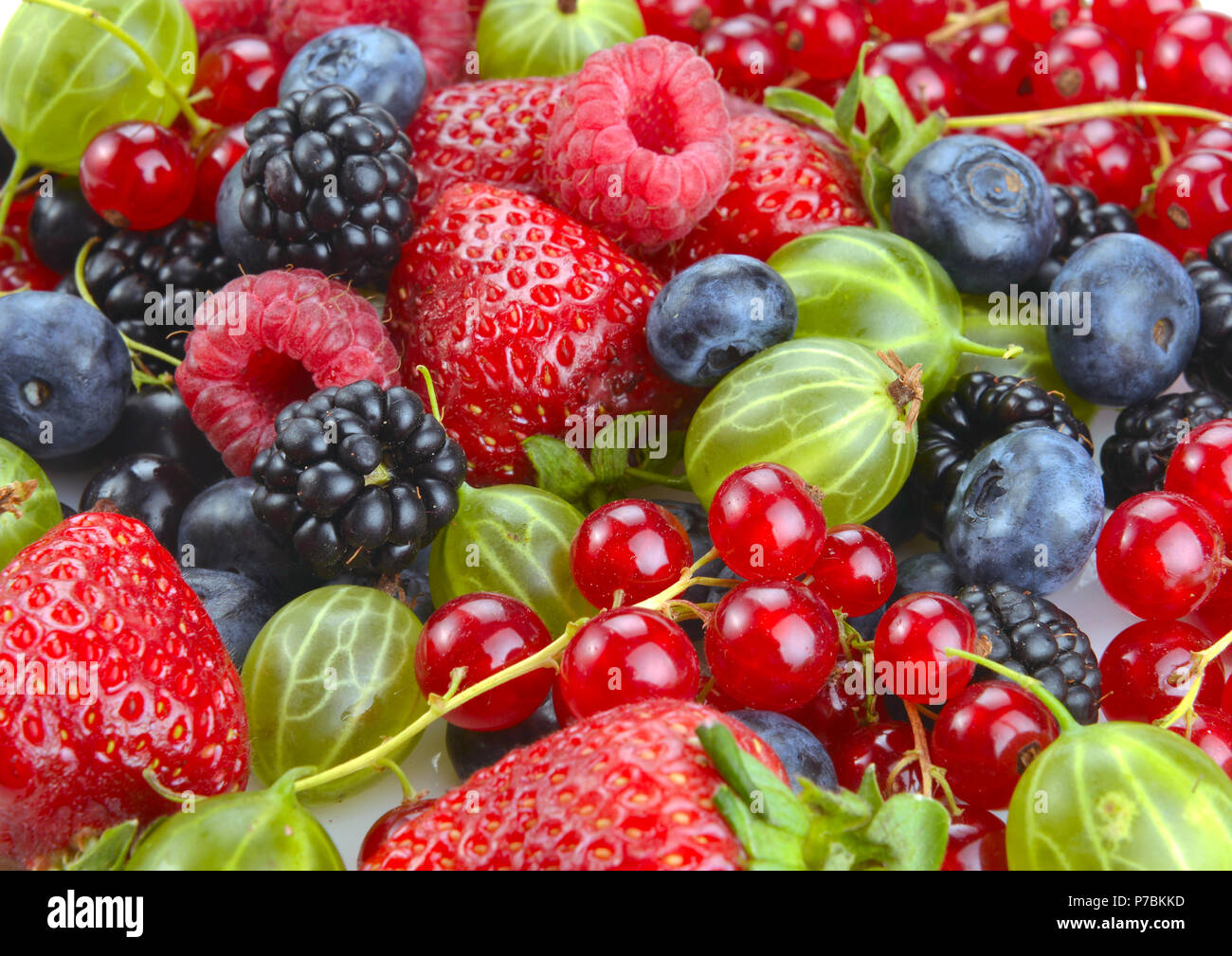 different fresh berries as background Stock Photo - Alamy