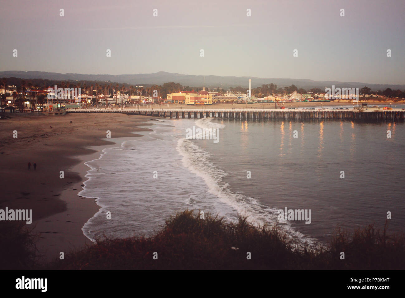 Sunset above the ocean pier in Santa Cruz, California, USA Stock Photo ...