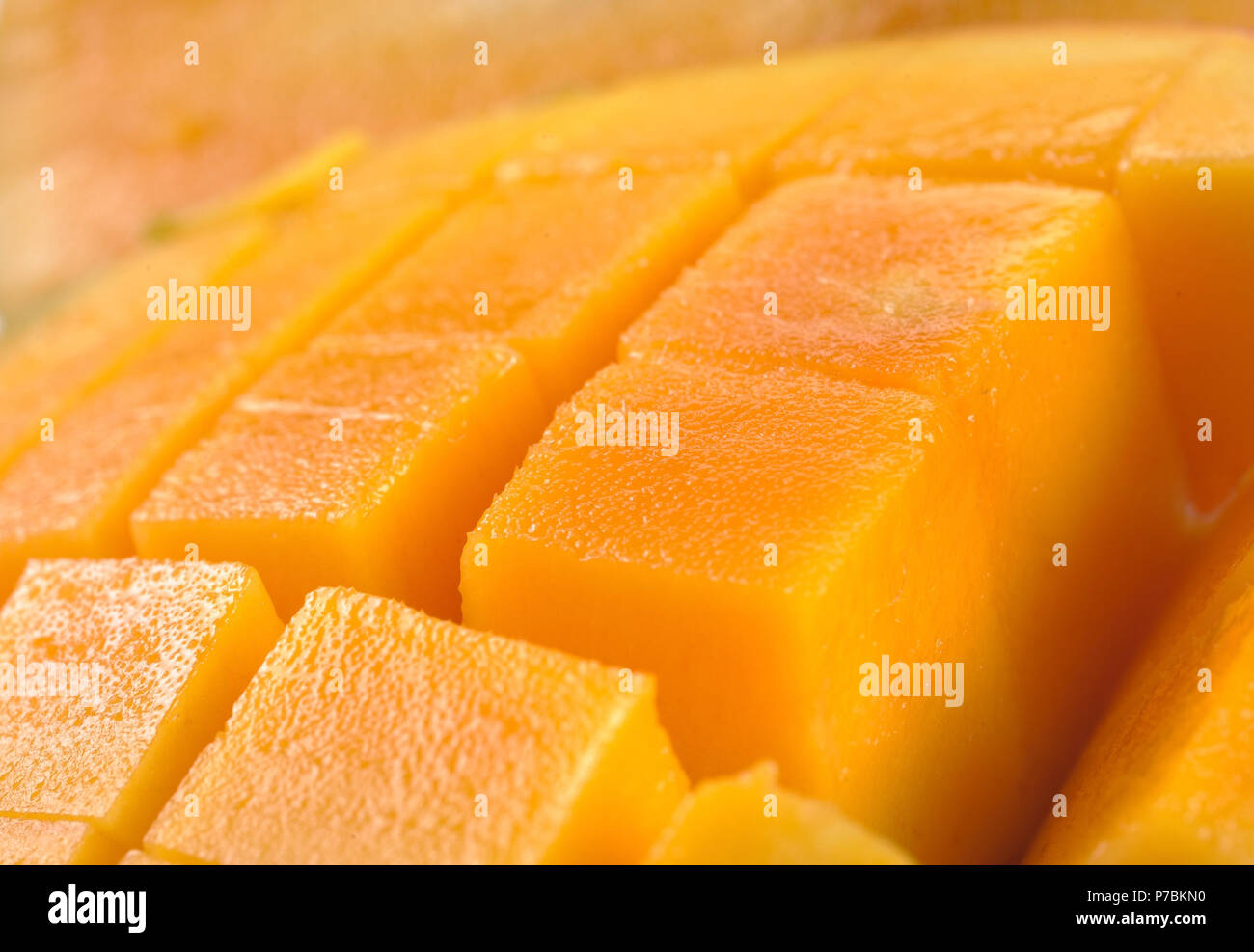 Fresh and colorful mango cut and cubed in its skin Stock Photo - Alamy