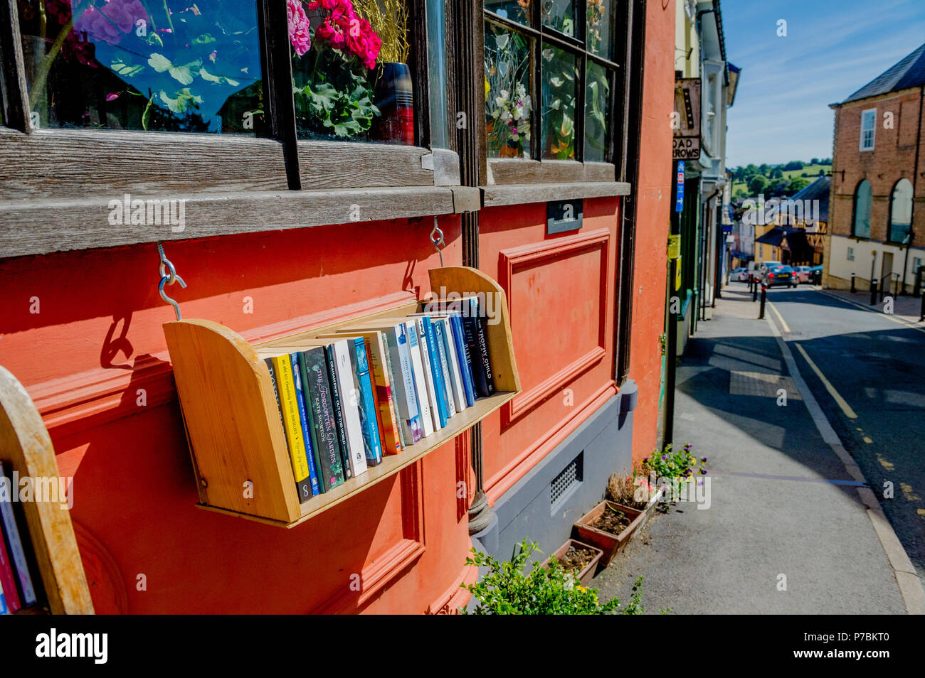 Books flowers on wooden hi-res stock photography and images - Alamy