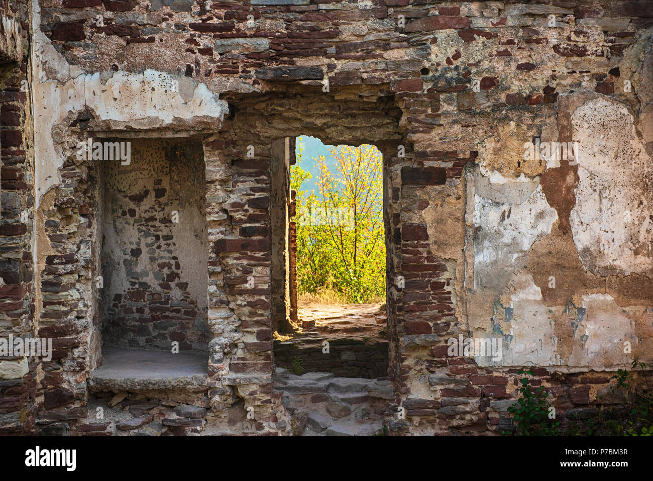 Old wall with breach Stock Photo - Alamy