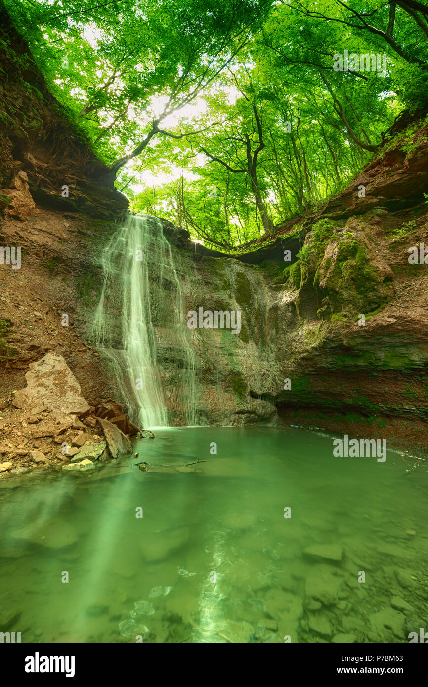 High mountain waterfall Stock Photo - Alamy