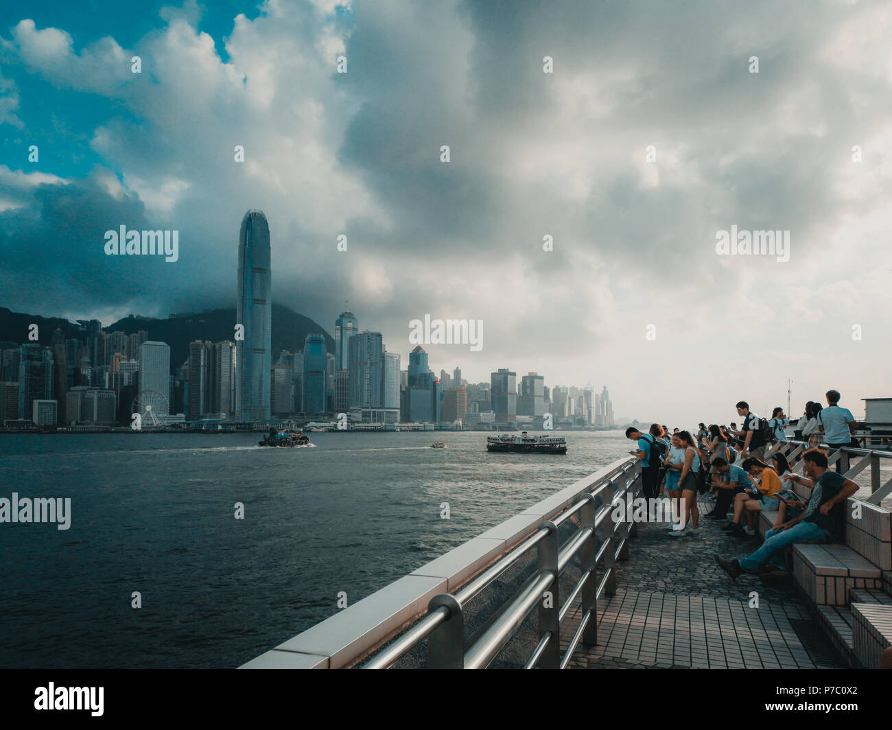 July 04, 2018: Tsim Sha Tsui, Hong Kong: Tourists in Hong Kong waterfront promenade Stock Photo ...