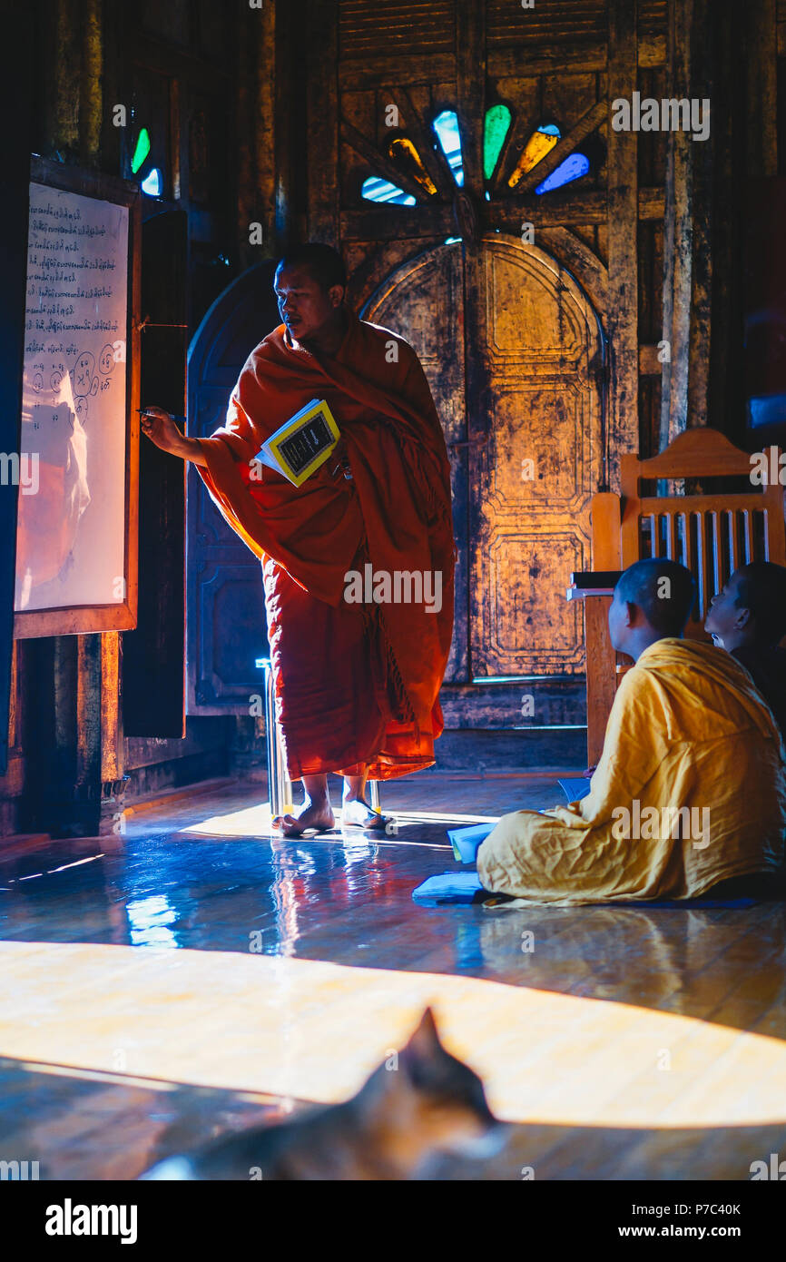 A monk teacher with his pupils in Myanmar Stock Photo - Alamy