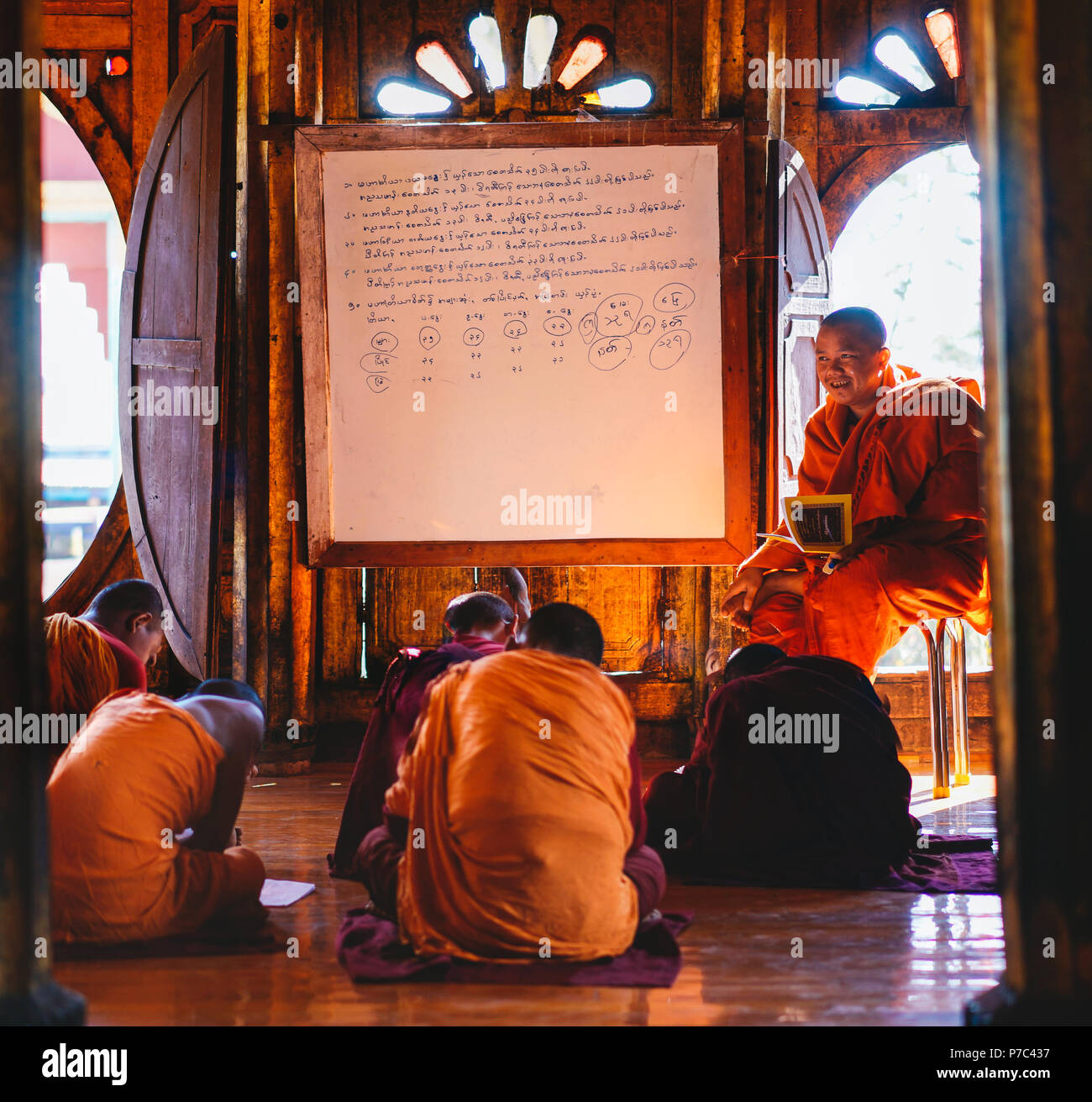 A monk teacher with his pupils in Myanmar Stock Photo - Alamy