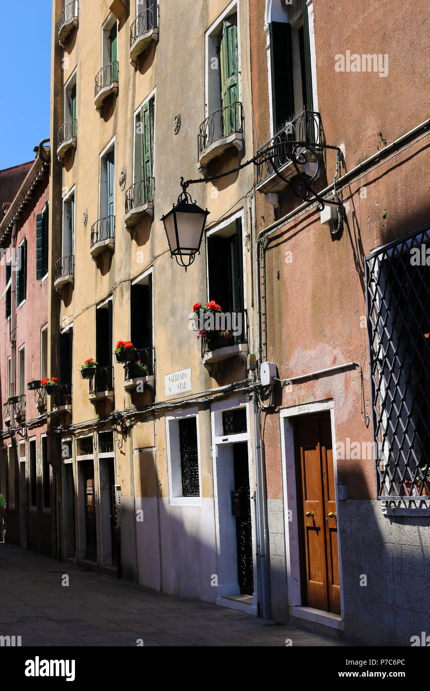 Old nice buildings in sun rays Stock Photo - Alamy