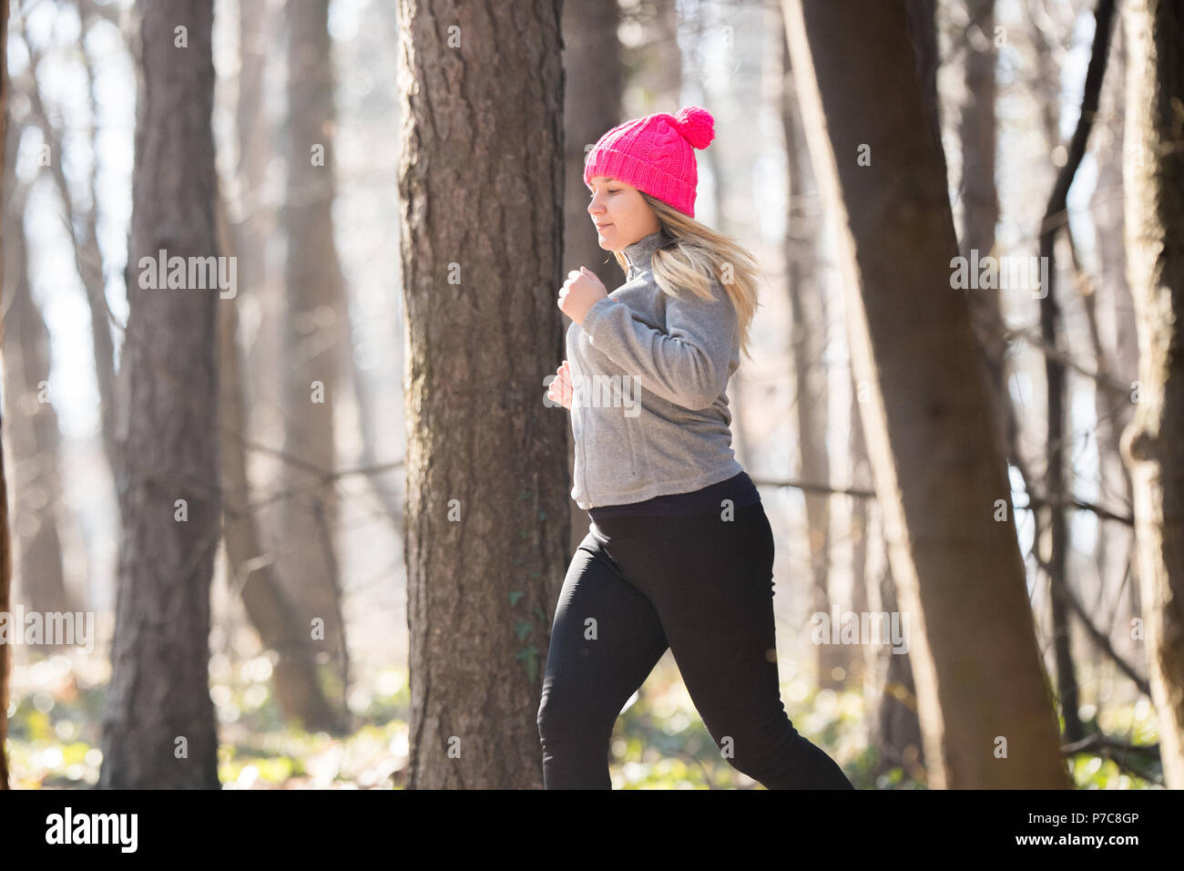 Girl running in forest during hi-res stock photography and images - Alamy