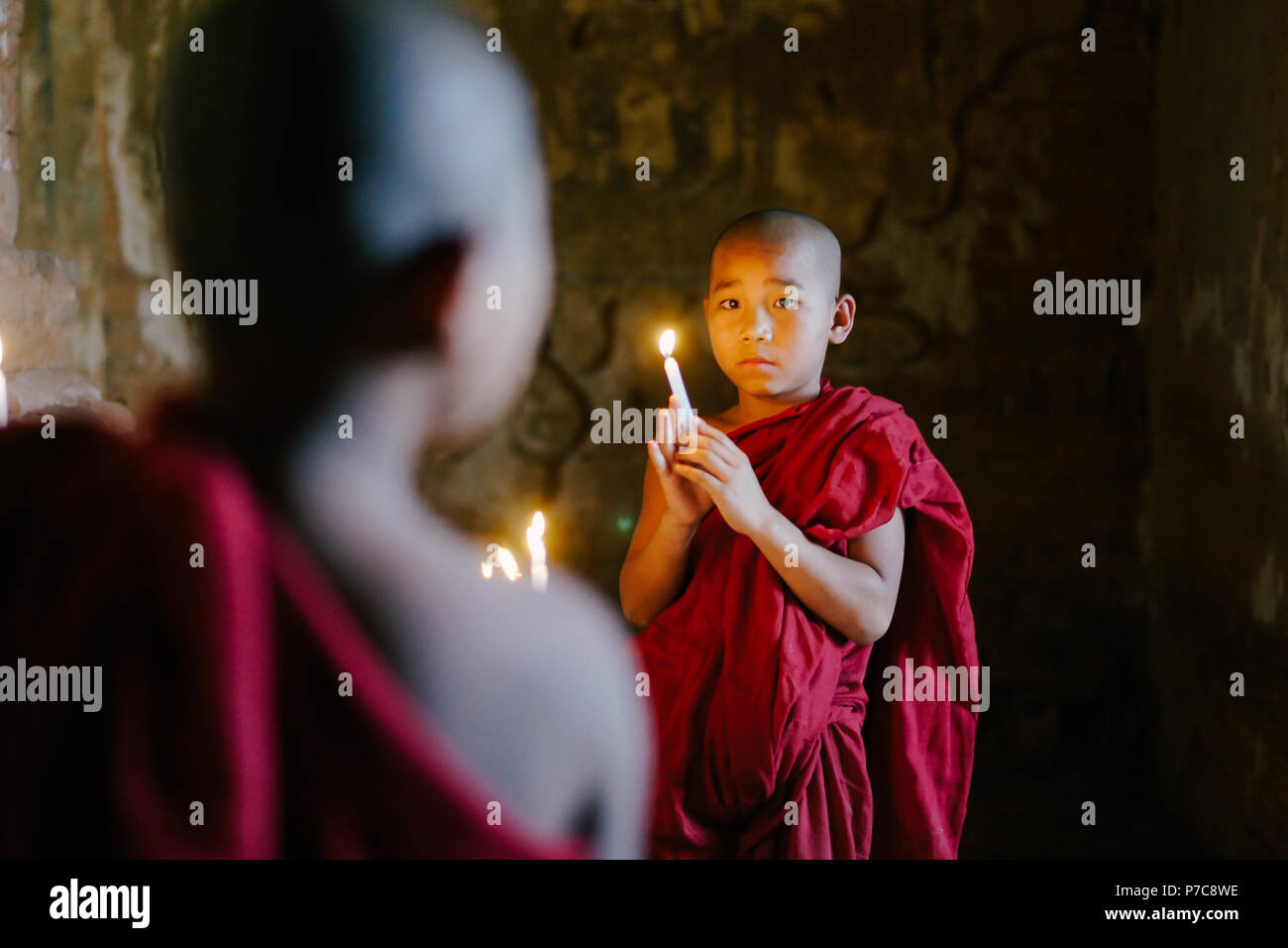 Two little monks in a ruin pagoda in Bagan, Myanmar Stock Photo - Alamy