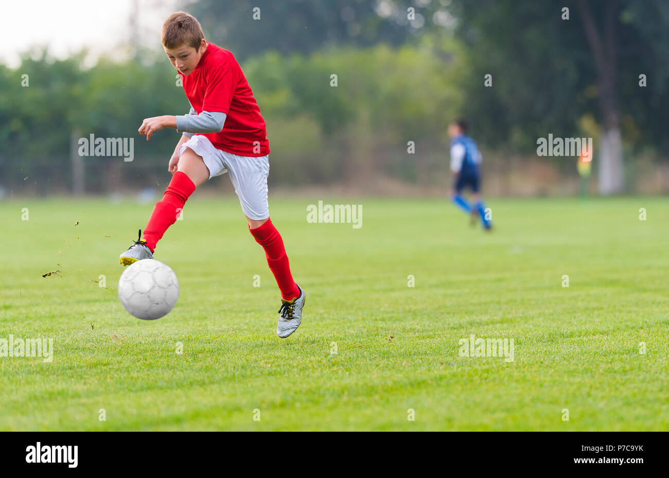 Boy on soccer field hi-res stock photography and images - Alamy