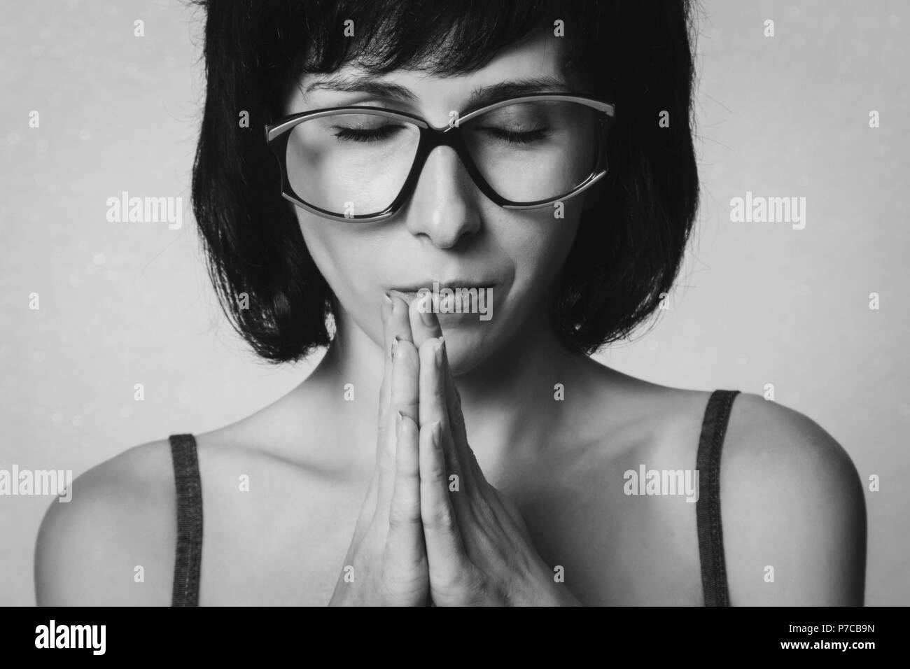 Girl praying Black and White Stock Photos & Images - Alamy