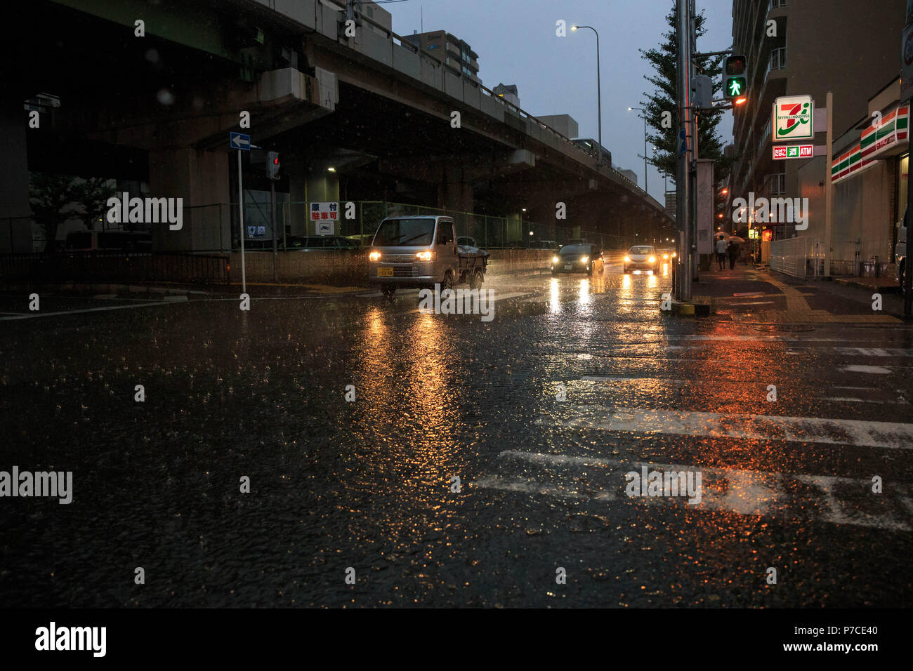 Osaka, Japan - July 5, 2018: Flooded crosswalk at intersection in Suita ...