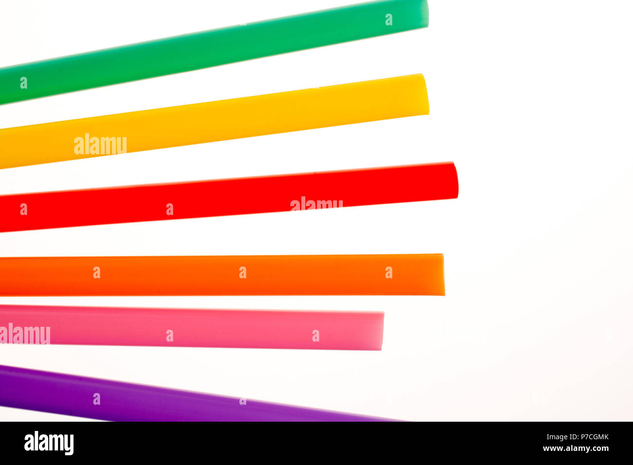 different color of straw on a white background Stock Photo - Alamy