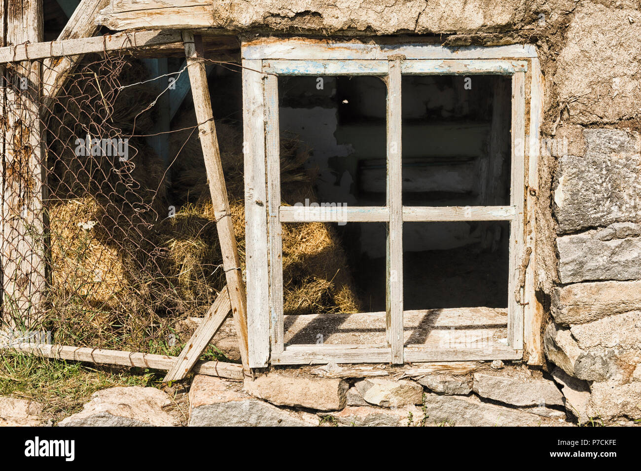Broken window of a barn, Bokdajeni village, Georgia Stock Photo - Alamy