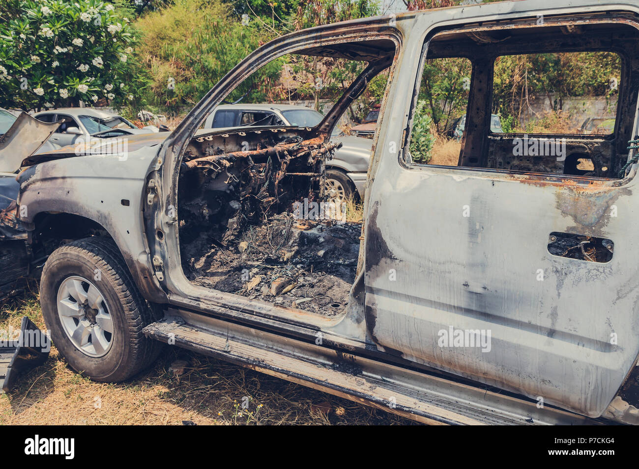 burnt car by accident in vehicle junk Stock Photo - Alamy