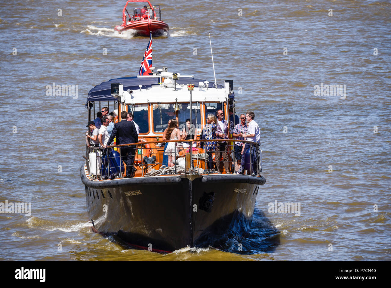 Havengore launch on the River Thames, London, UK, with people during ...