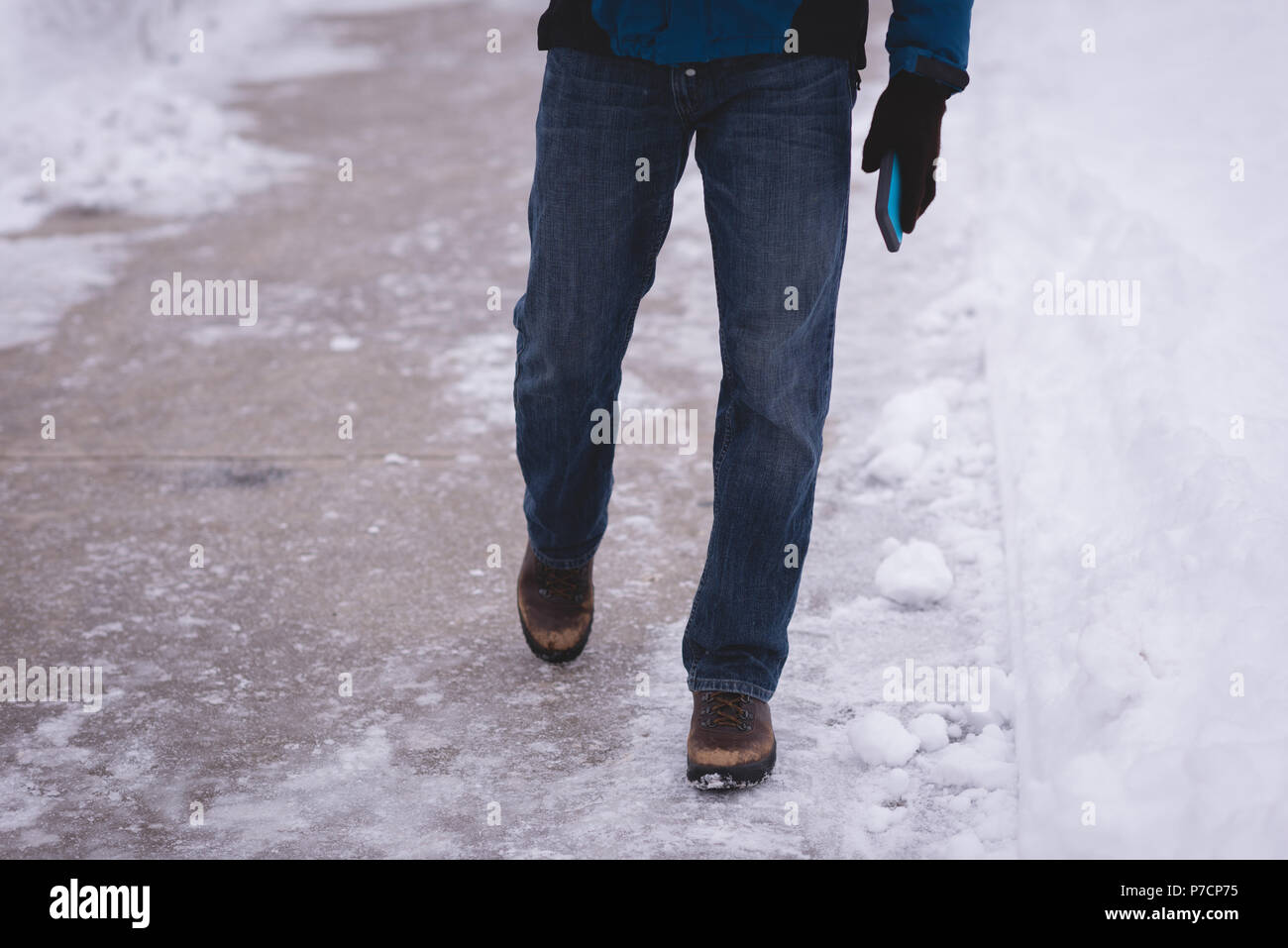 Tourist walking on snow covered hi-res stock photography and images - Alamy