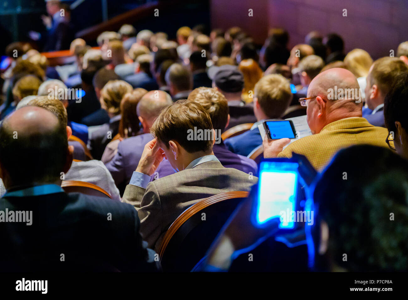 People attend business conference in the congress hall Stock Photo - Alamy